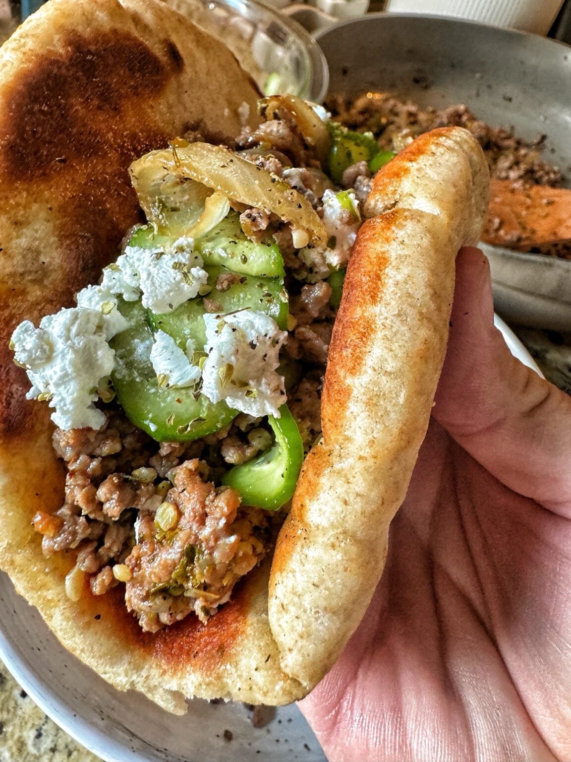 Mediterranean Inspired Hamburger Pitas with Peppers and Onions - The ...